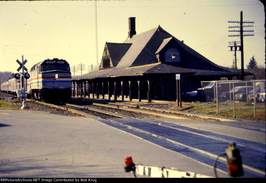 AMTK 216 leads the eastbound New England Section of the Lake Shore Limited past the former NYC ...